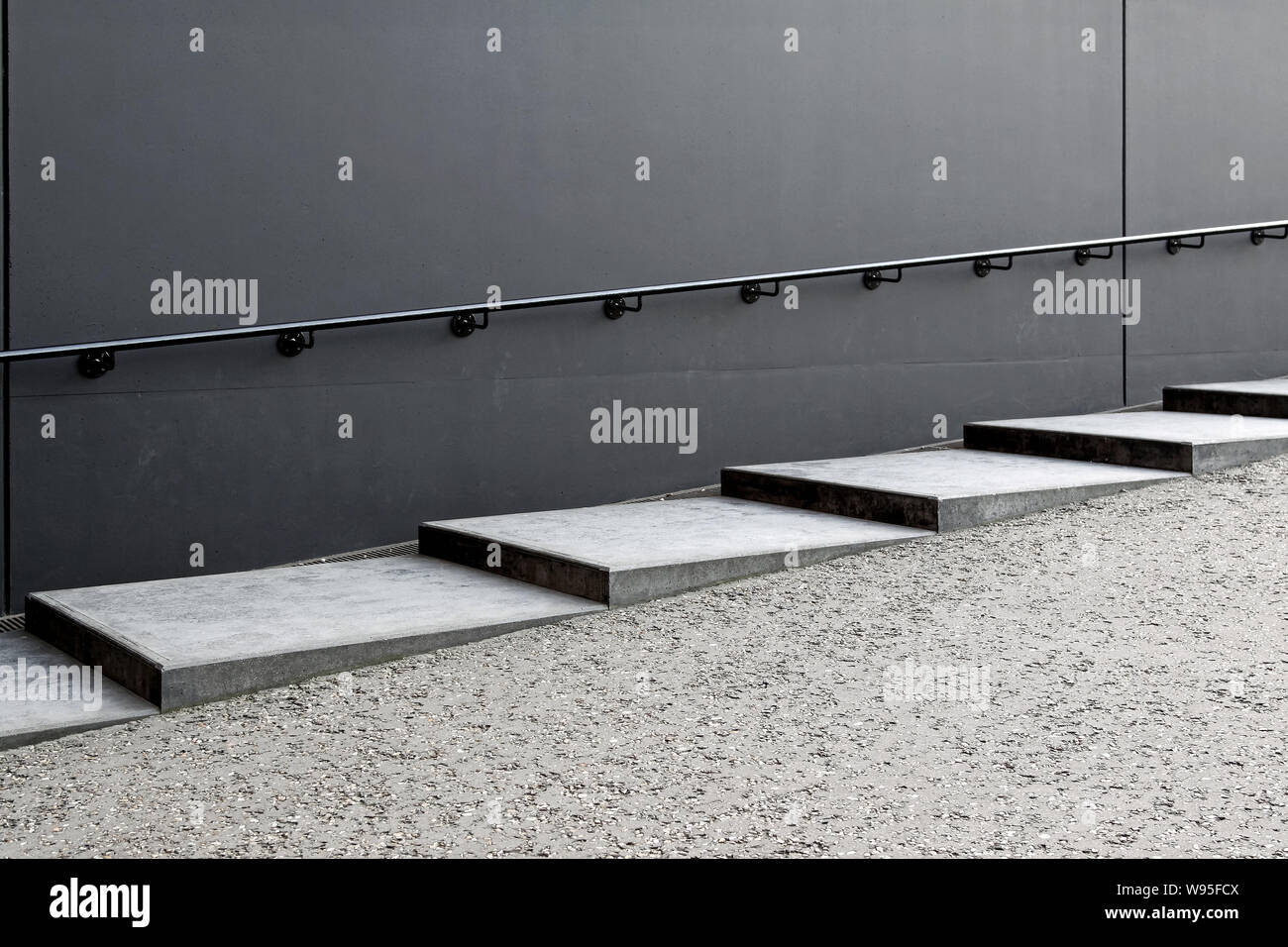 Rough industrial style concrete stairs outside the building Stock Photo ...