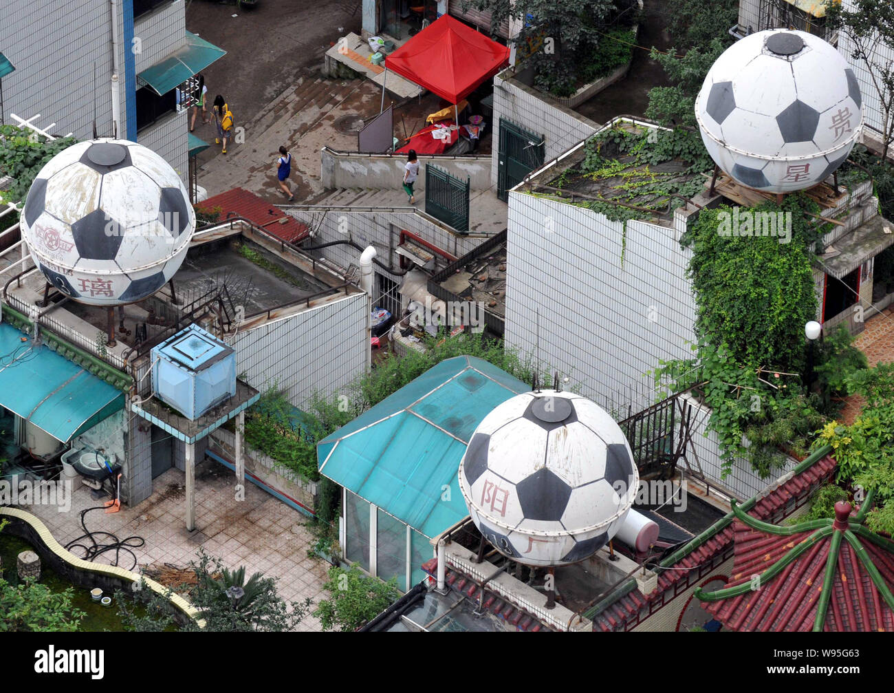 Football-shaped water tanks supplying tap water are pictured on the ...