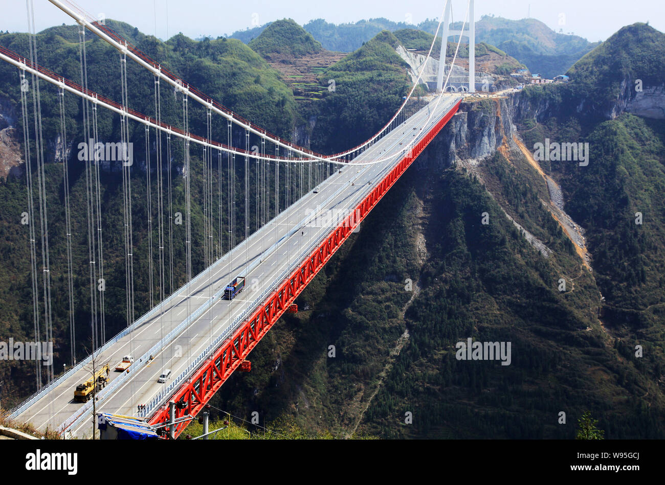 Vehicles pass through Aizhai Suspension Bridge in Aizhai town, Jishou ...