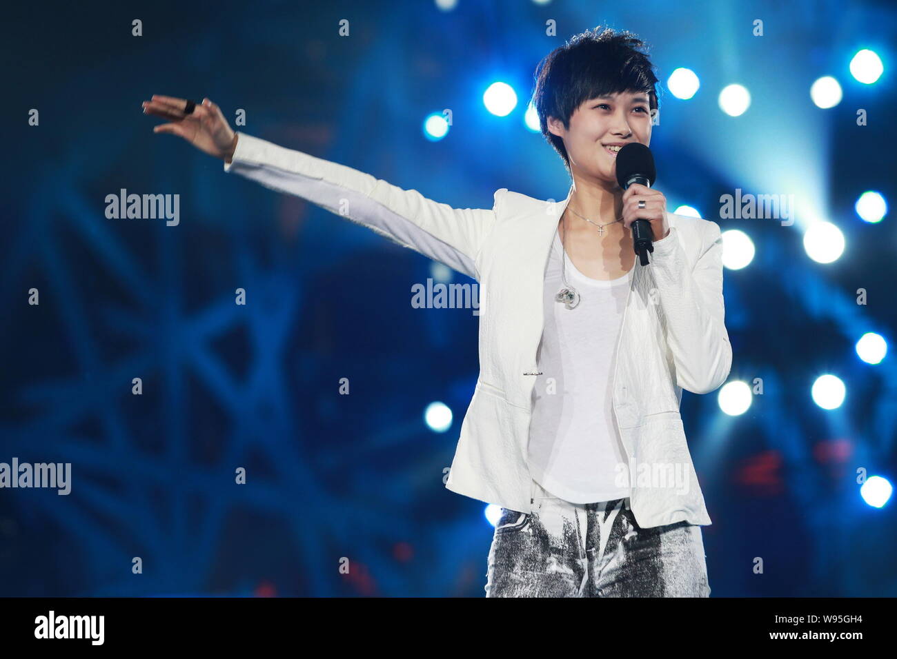 Chinese singer Li Yuchun performs during a gala celebrating the triumph ...