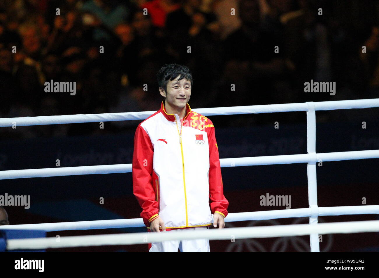 Gold medalist Zou Shiming of China poses in the award ceremony of the ...