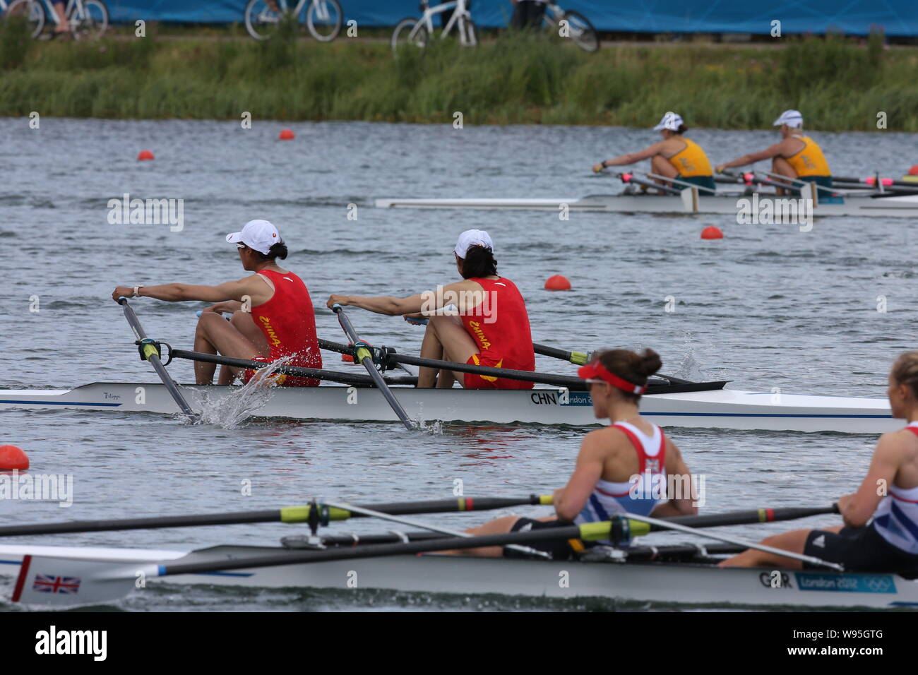 Xu Dongxiang and Huang Wenyi of China, left, are pictured after winning ...