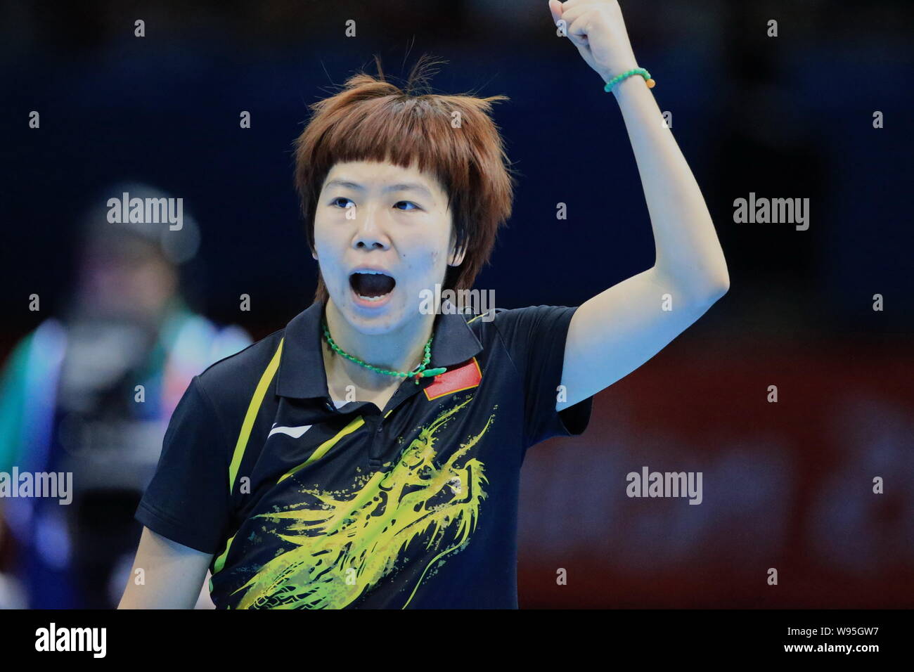 Chinas Li Xiaoxia reacts while competing against Ai Fukuhara of Japan ...