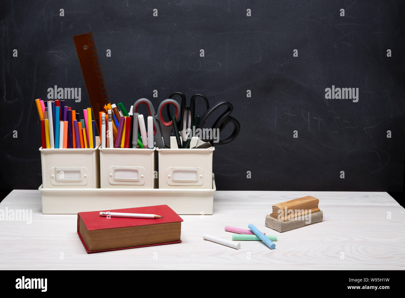 Back to school background with book, pencils, crayons, chalk and other ...