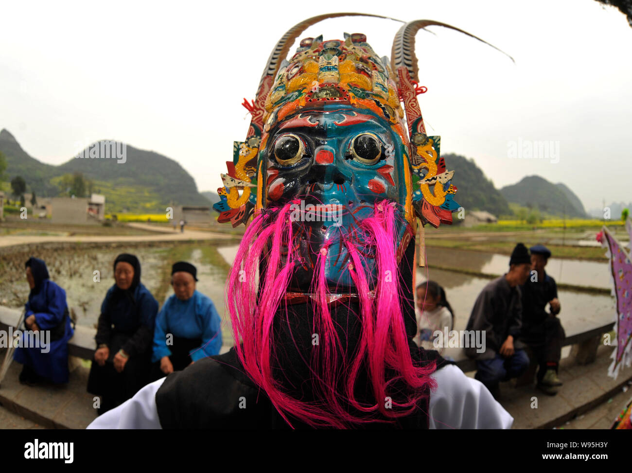 A Nuo opera actor wears a mask in Anshun, southwest Chinas Guizhou ...