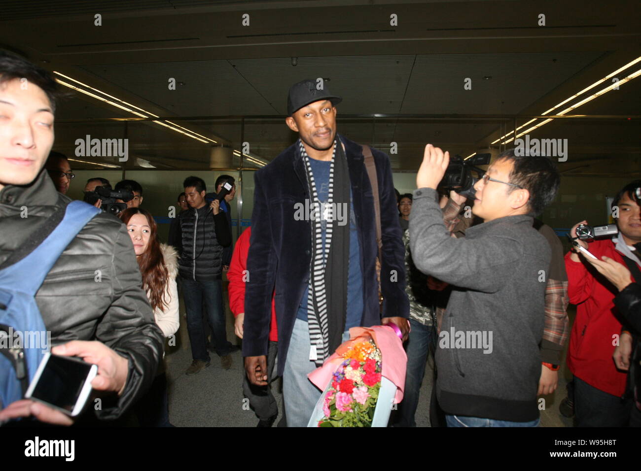 Former NBA player D.J. Mbenga arrives at Qingdao Liuting International ...