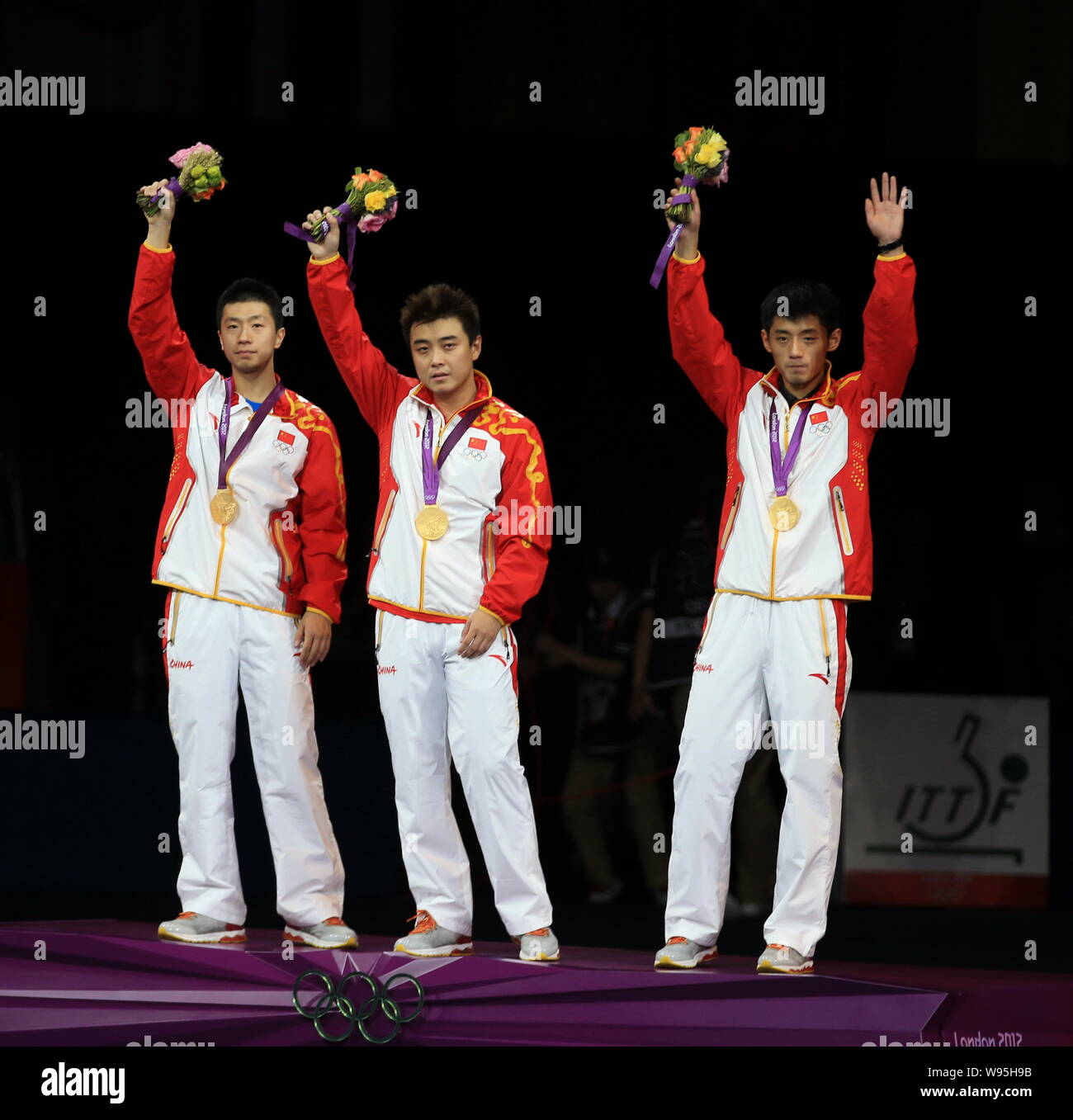 (From left to right) Gold medalists Ma Long, Wang Hao and Zhang Jike of ...