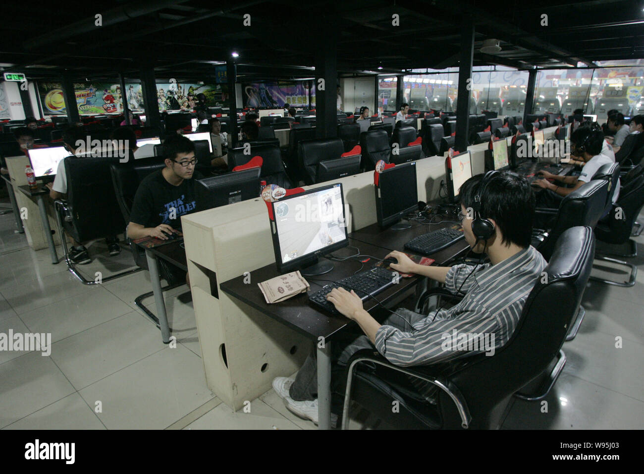 --File--Chinese netizens are seen at an Internet cafe in Beijing, China ...