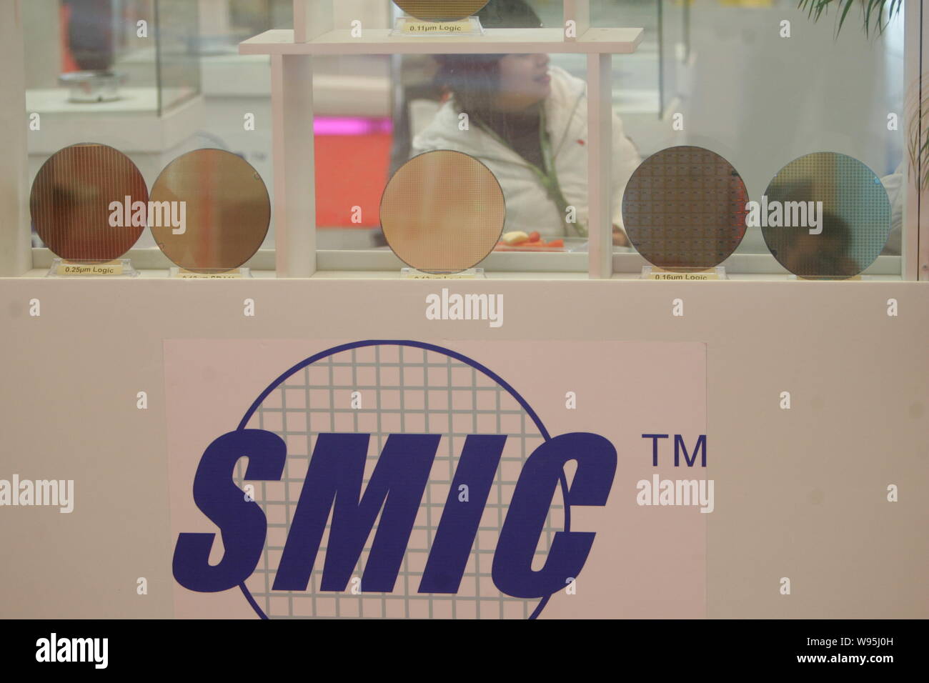 --File--Chips are seen on display at the stand of Semiconductor ...