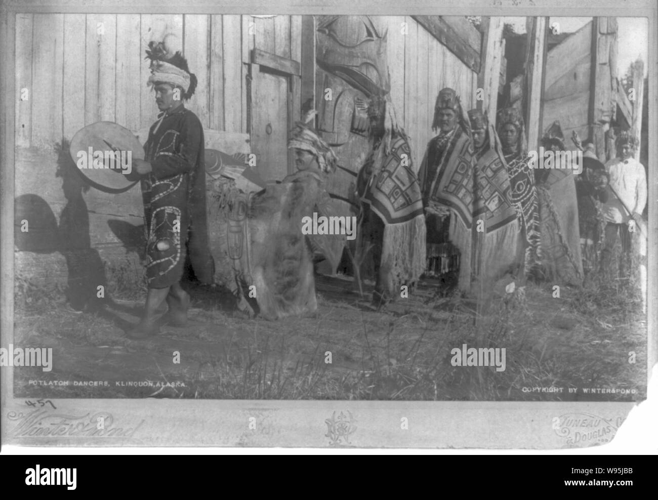 Alaskan Indians in old dancing costumes: Potlatch dancer, Klinquon ...