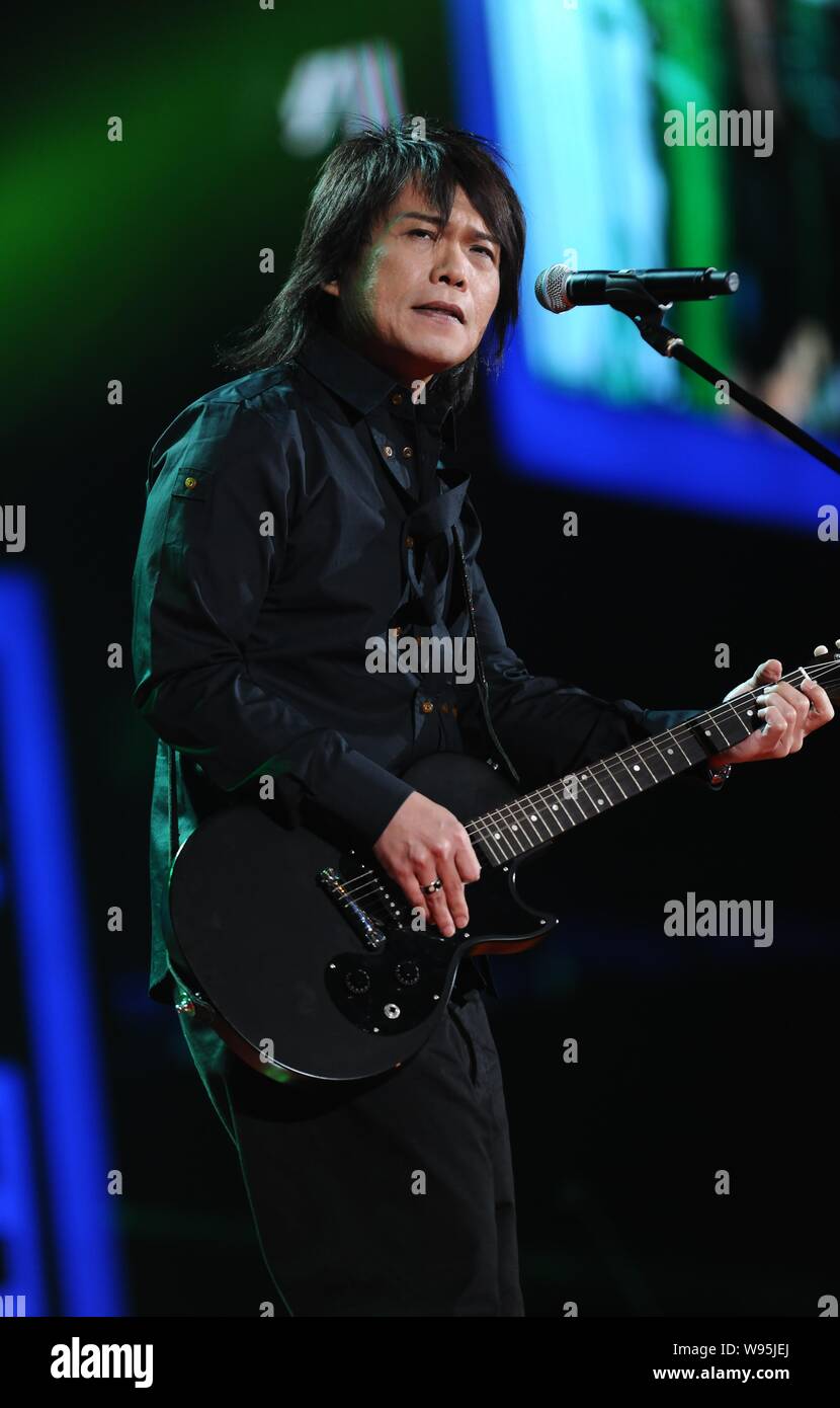 Taiwanese singer Wu Bai performs during the 11th CCTV-MTV Music Awards ...