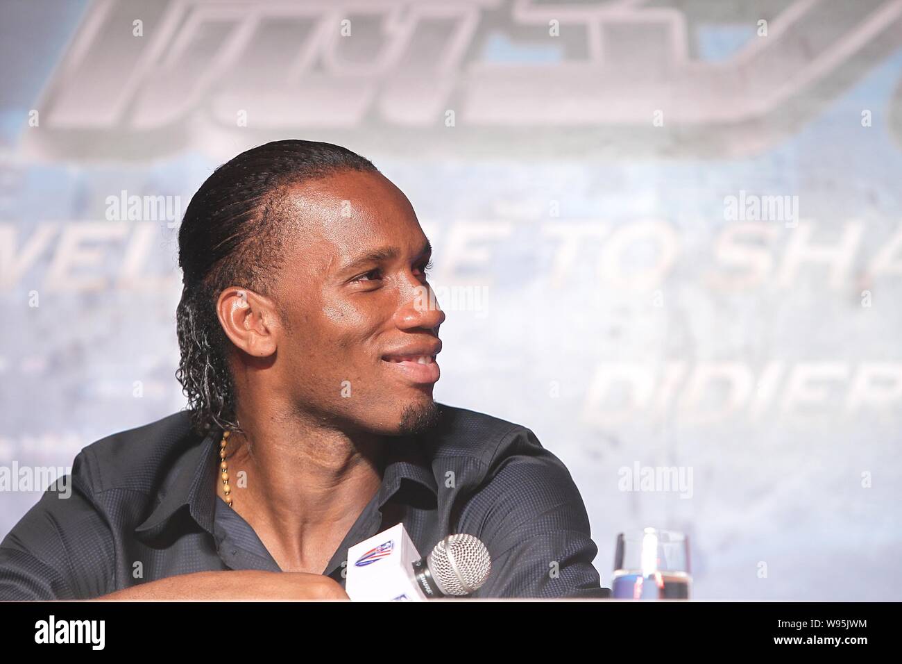 Former Chelsea midfielder Didier Drogba attends a press conference by ...