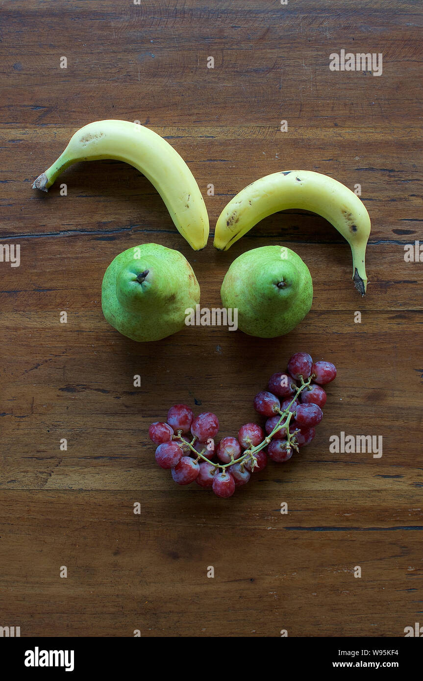 Smiley face made fruits banana hi-res stock photography and images - Alamy