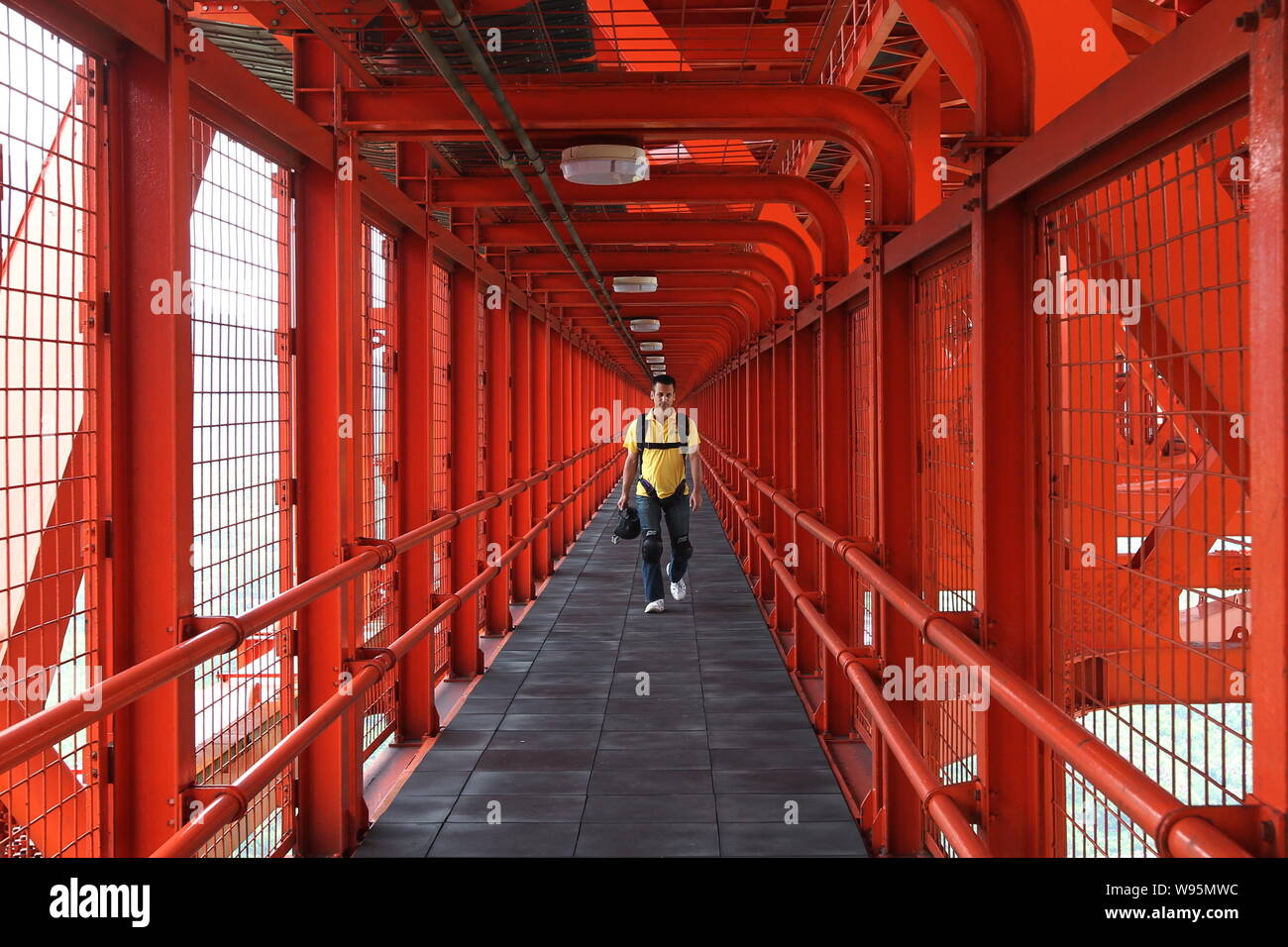 A parachute jumper gets ready to jump off the Balinghe Bridge in Anshun ...