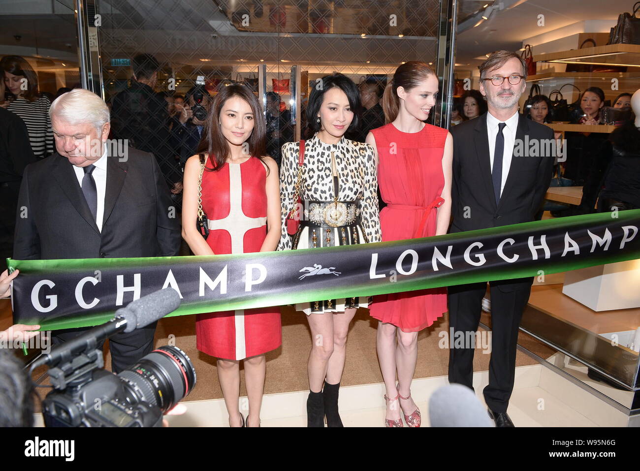 Hong Kong actor Carina Lau, center, Chinese actress Gao Yuanyuan ...
