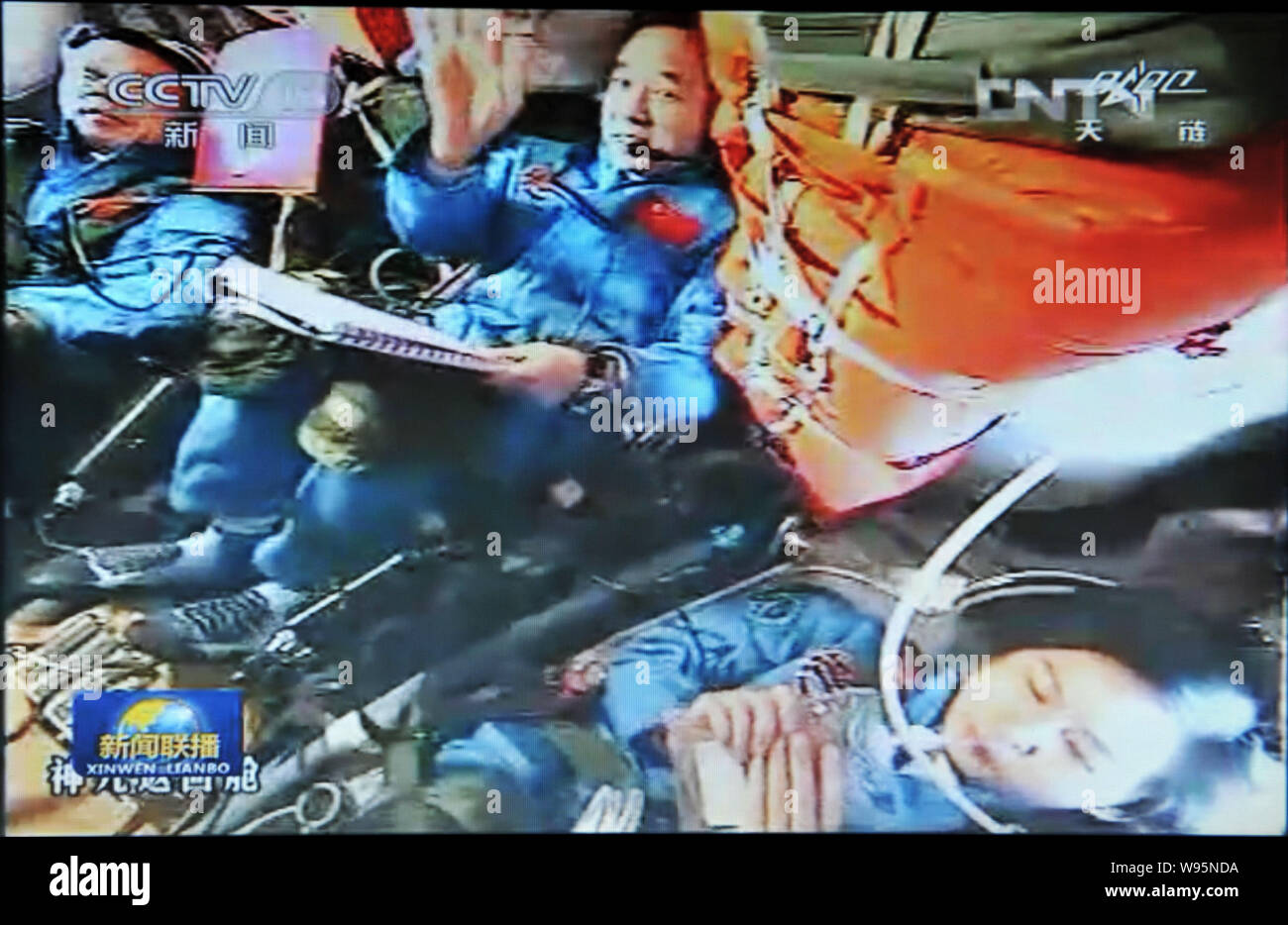 This TV grab shows Chinese astronauts (from left) Liu Wang, Jing ...