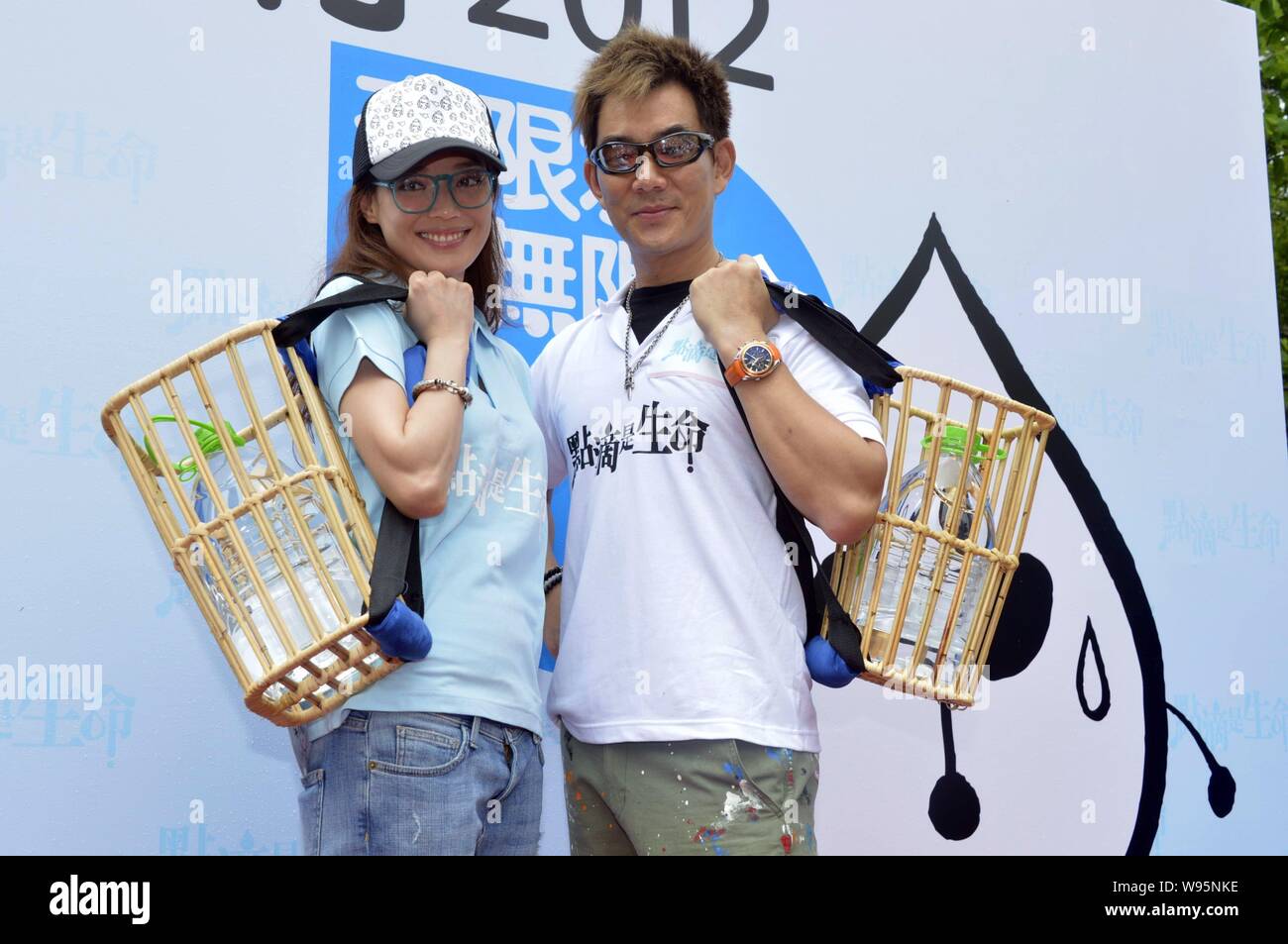 Taiwanese singer and actor Richie Jen and actress Shu Qi pose during a ...