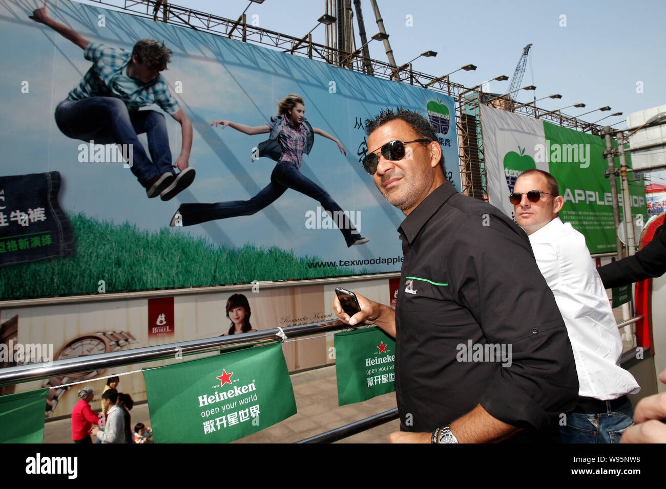 Former Dutch soccer stars Ruud Gullit, left, and Ronald de Boer pose on ...