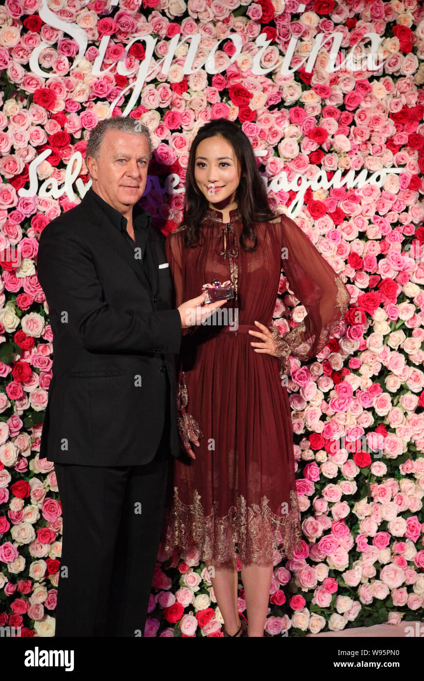 Chinese singer and actress Cecilia Han Xue, right, poses with Ferragamo ...