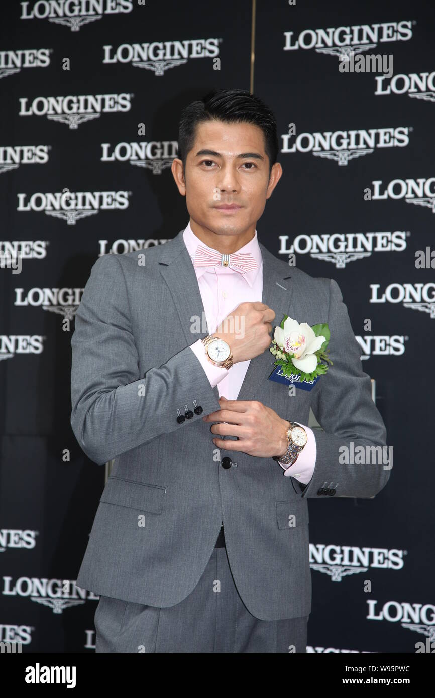 Hong Kong singer and actor Aaron Kwok poses at the opening ceremony for ...