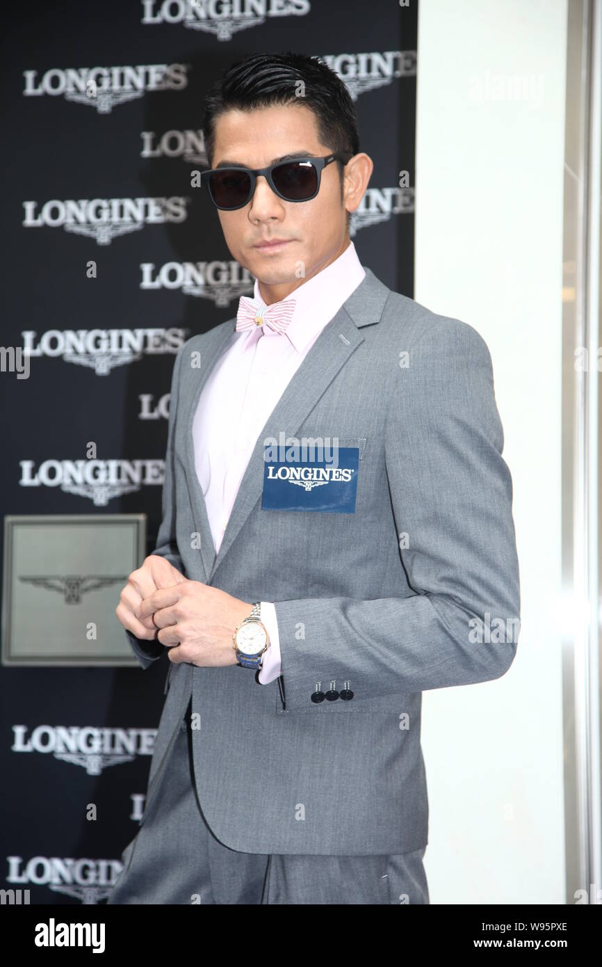 Hong Kong singer and actor Aaron Kwok poses at the opening ceremony for ...