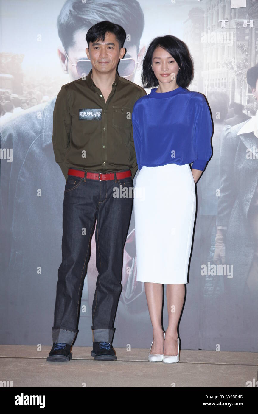 Hong Kong actor Tony Leung, left, and Chinese actress Zhou Xun attend a ...