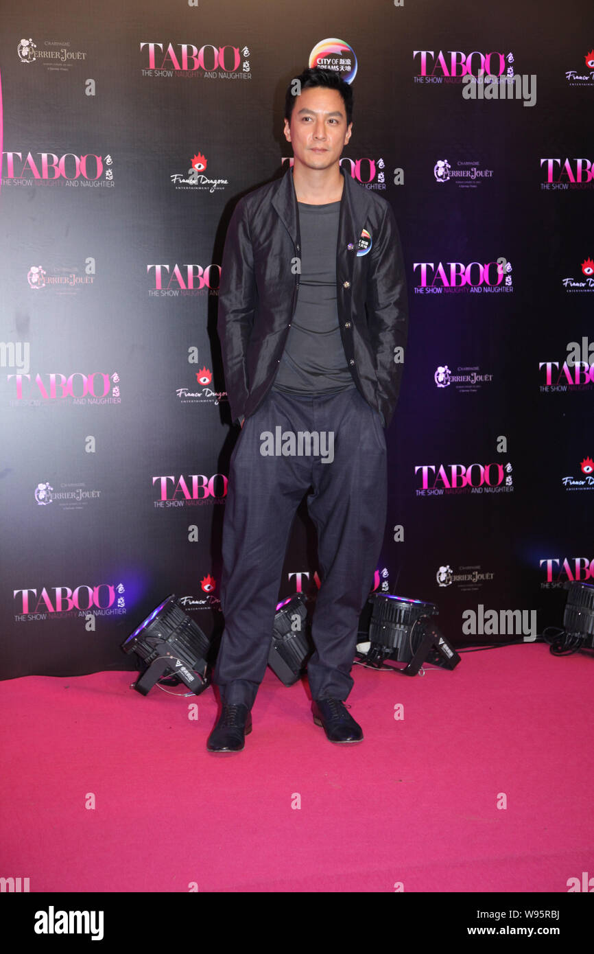 Hong Kong actor Daniel Wu poses for photos after arriving for the debut ...