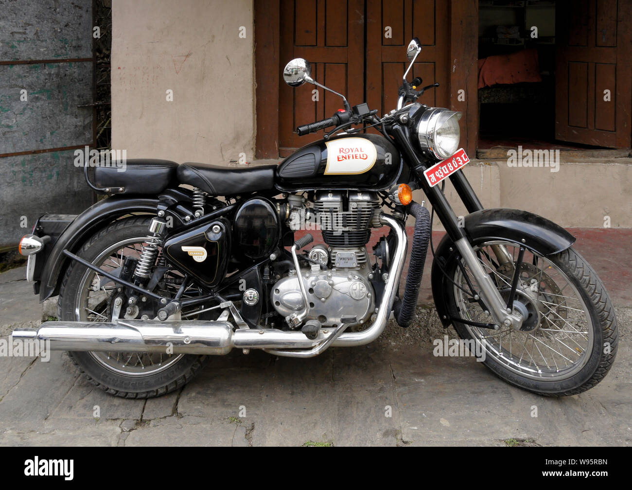 British Royal Enfield motorcycle parked outside building, Pokhara ...