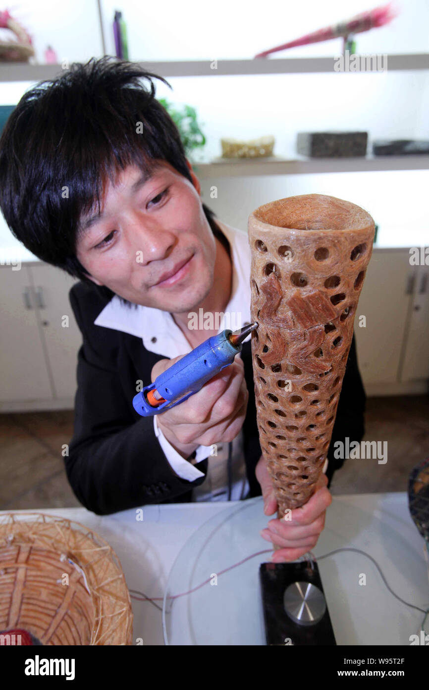 Chinese hairstylist Huang Xin puts final touches on his hair-made ...