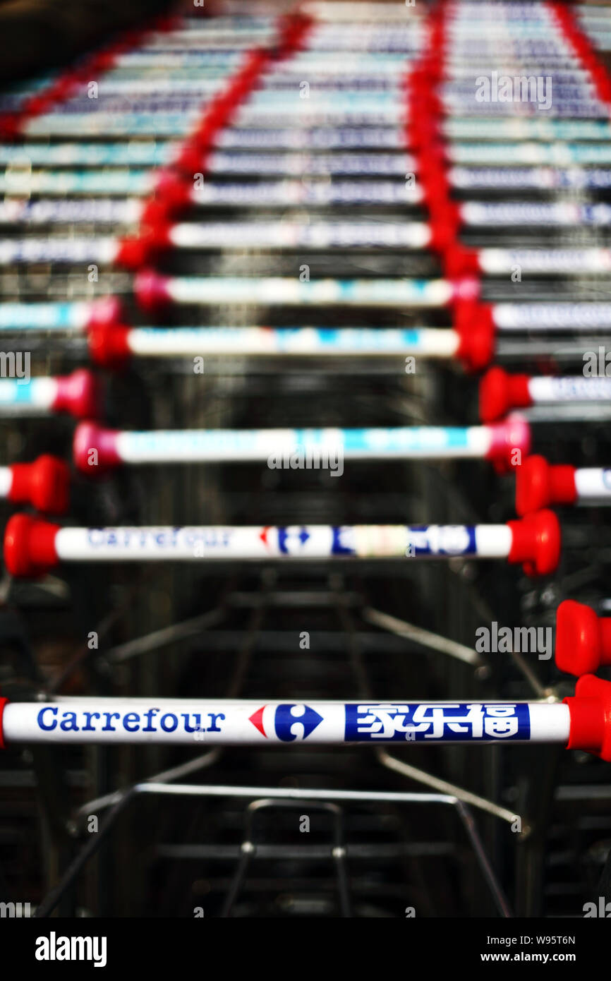 --FILE--Shopping carts are lined up at a Carrefour supermarket in ...