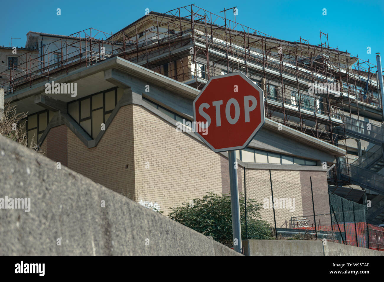 Stop sign on the background of the reconstruction of the building Stock ...