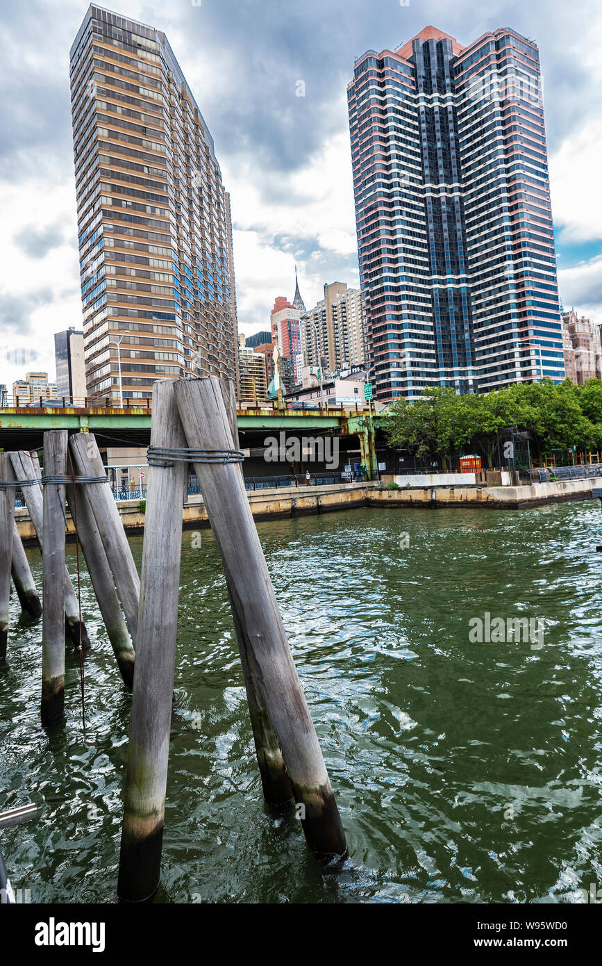 Old wooden pillar on a jetty of East River in Murray Hill, Manhattan ...
