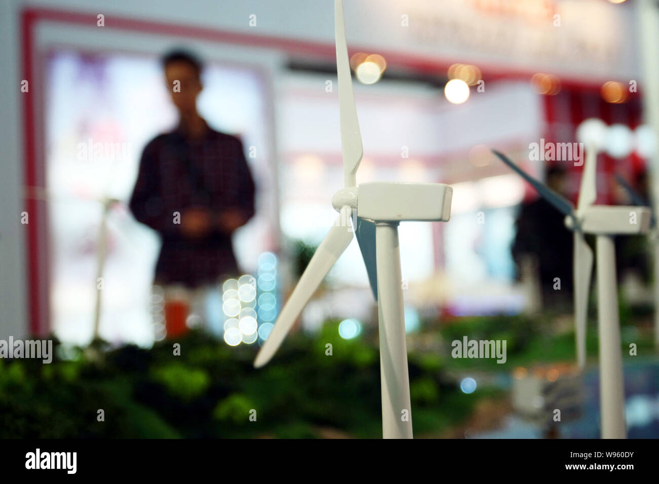 Models of wind turbines are seen on display during the 6th China ...