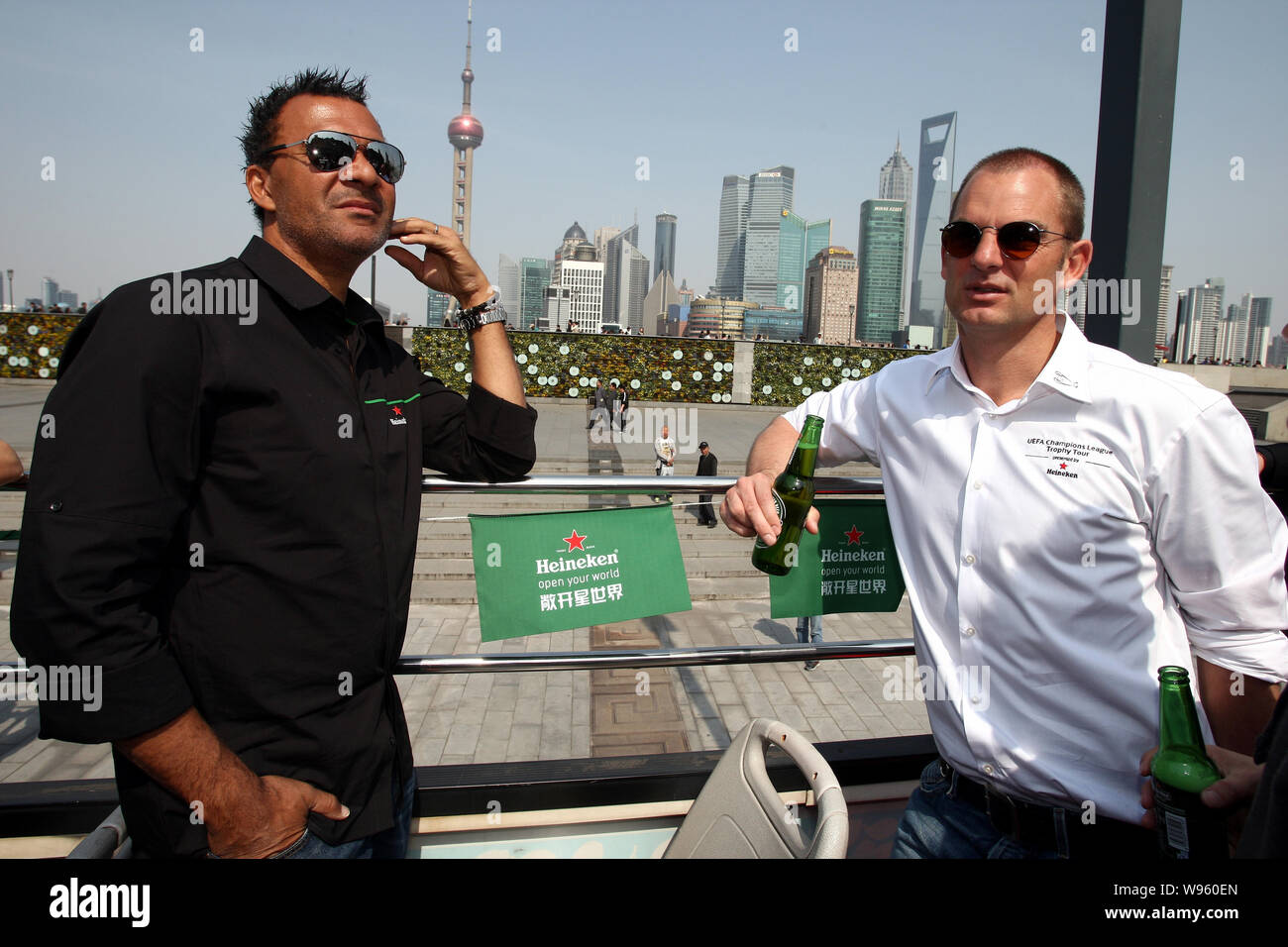 Former Dutch soccer stars Ruud Gullit, left, and Ronald de Boer pose on ...