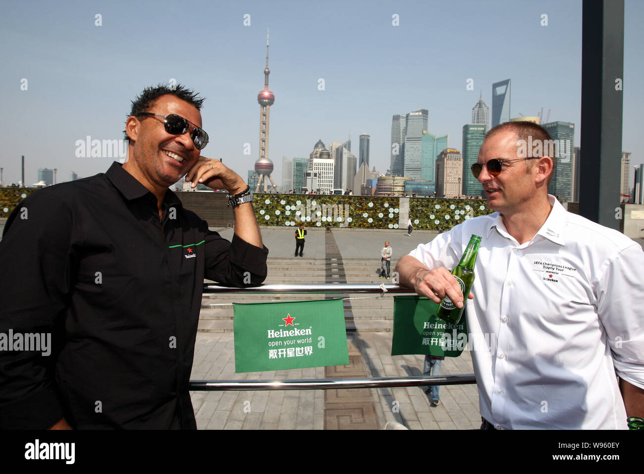 Former Dutch soccer stars Ruud Gullit, left, and Ronald de Boer pose on ...