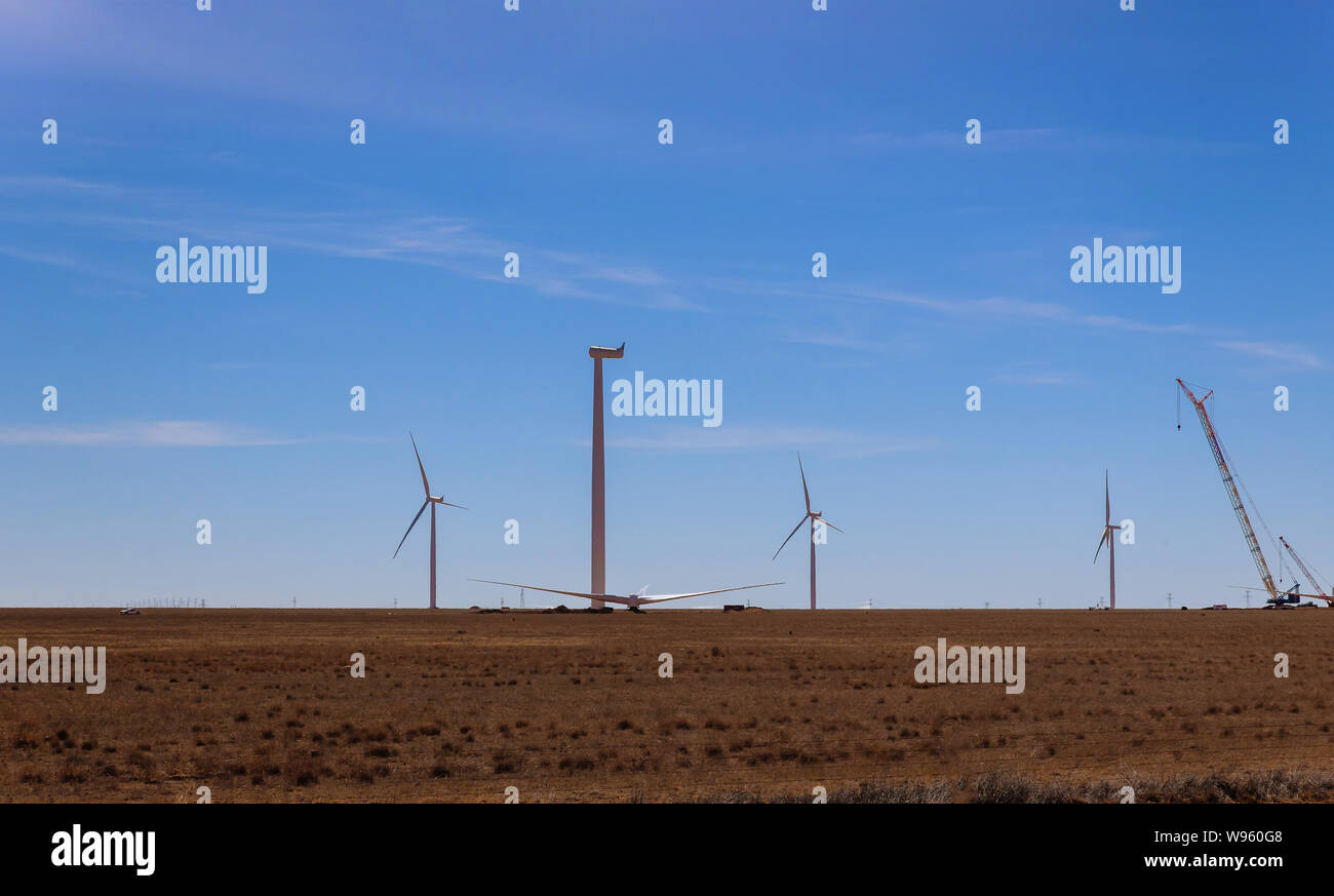 Wind farm construction building of new windmill in the wind power ...