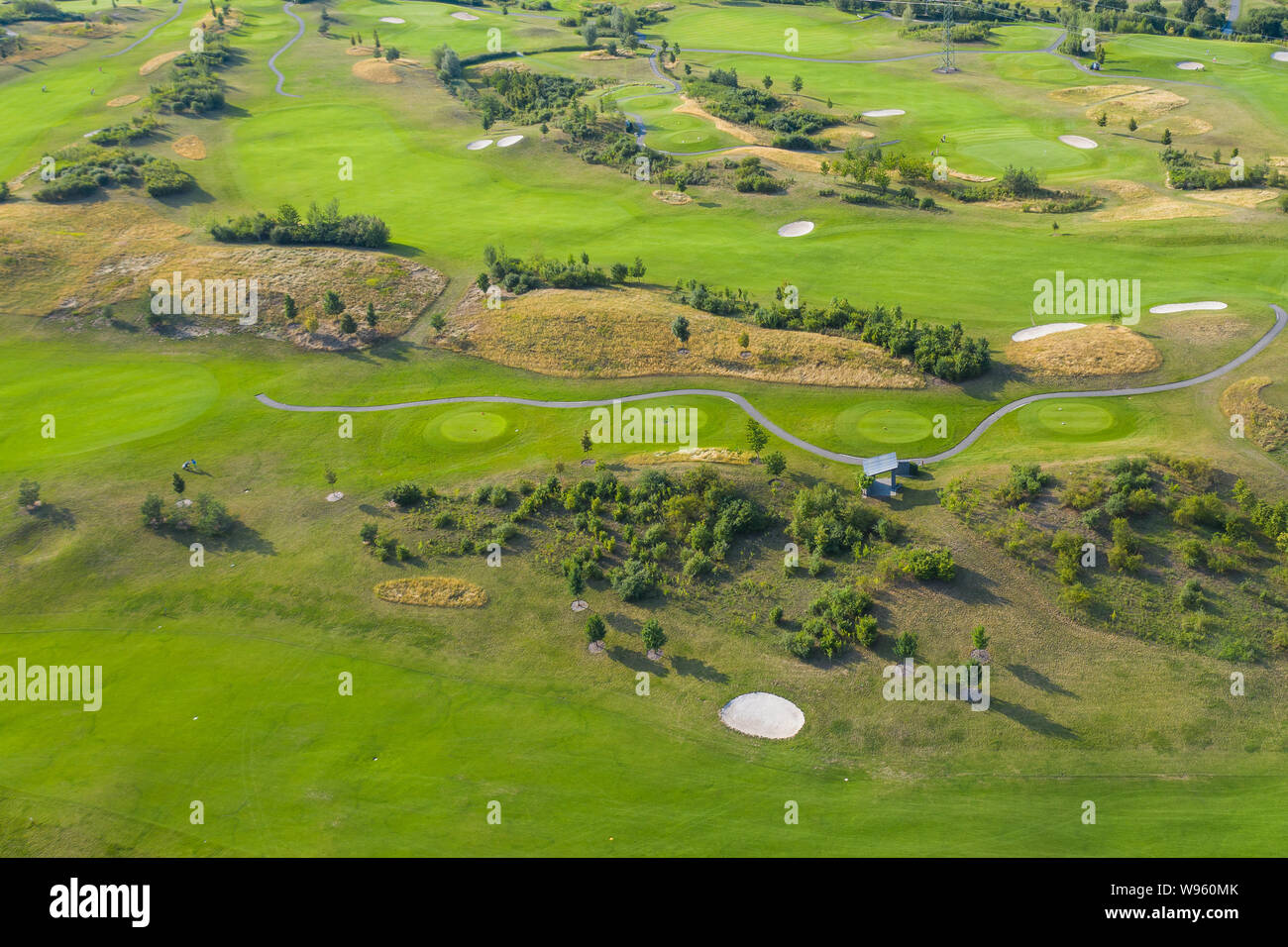 Aerial view of golf course. Drone or helicopter view of green field ...