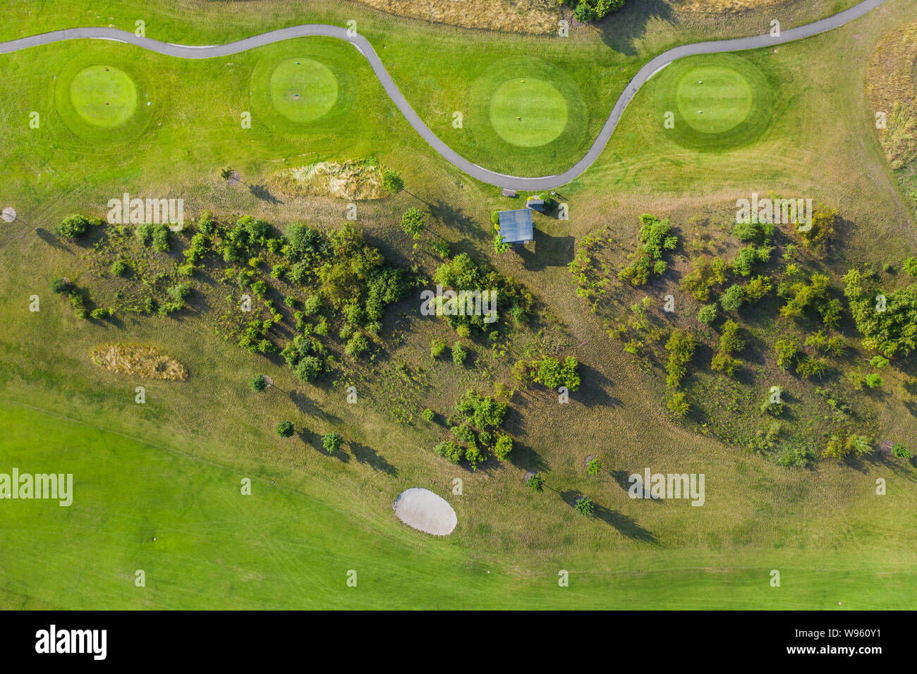 Aerial view of golf course. Drone or helicopter view of green field ...