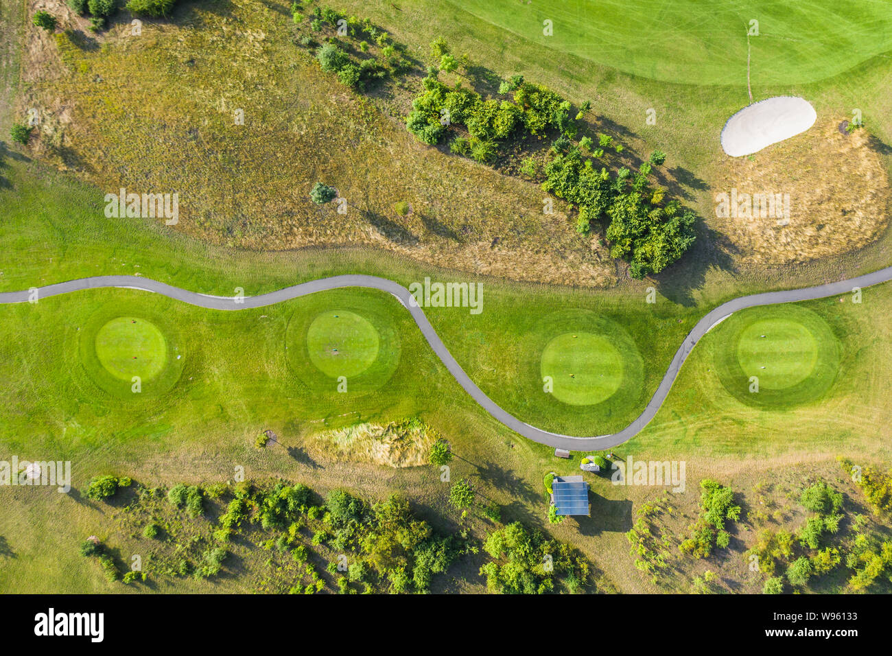 Aerial view of golf course. Drone or helicopter view of green field ...