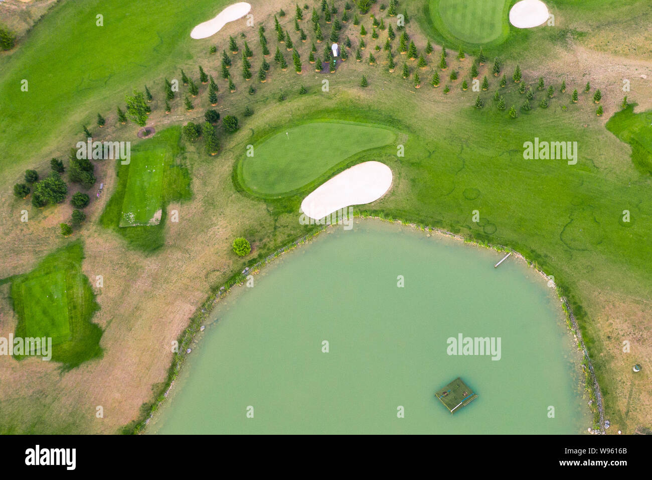 Aerial view of golf course. Drone or helicopter view of green field ...