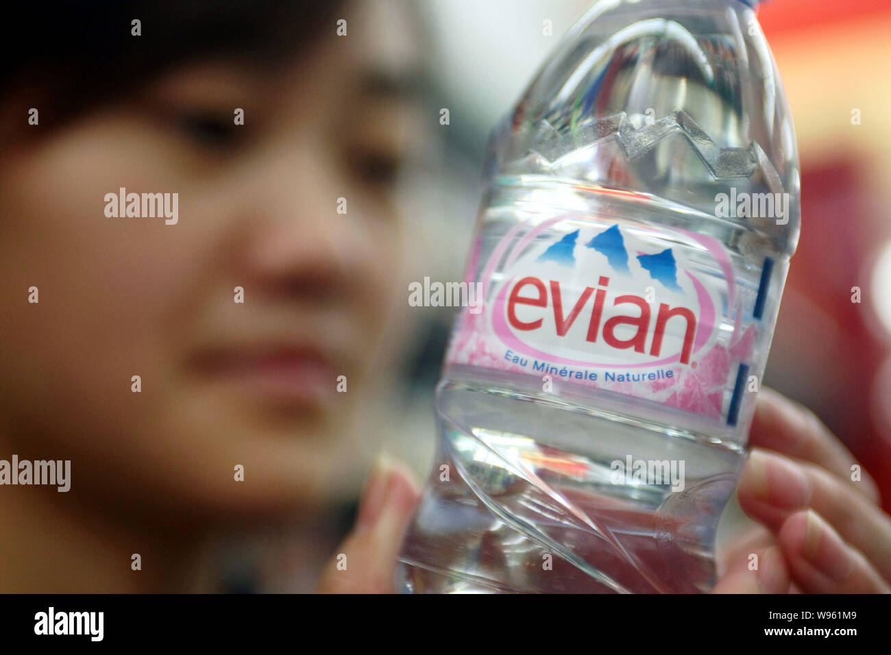 Evian water bottle hi-res stock photography and images - Alamy