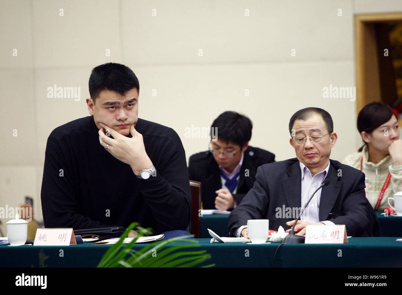 Retired Chinese basketball superstar Yao Ming takes part in a training ...