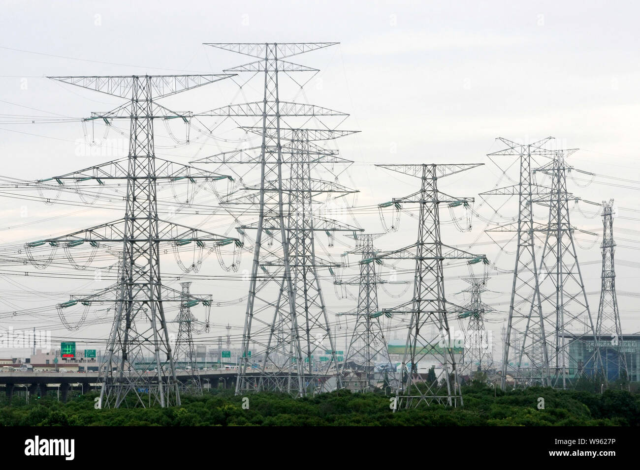 Pylons and high-voltage power lines are pictured in Shanghai, China, 7 ...