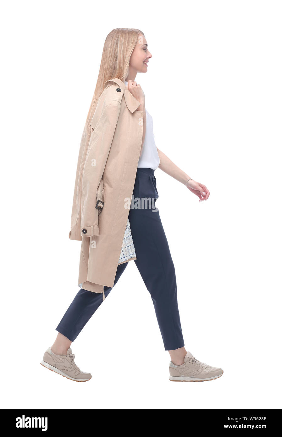 side view. a confident young woman steps forward Stock Photo - Alamy