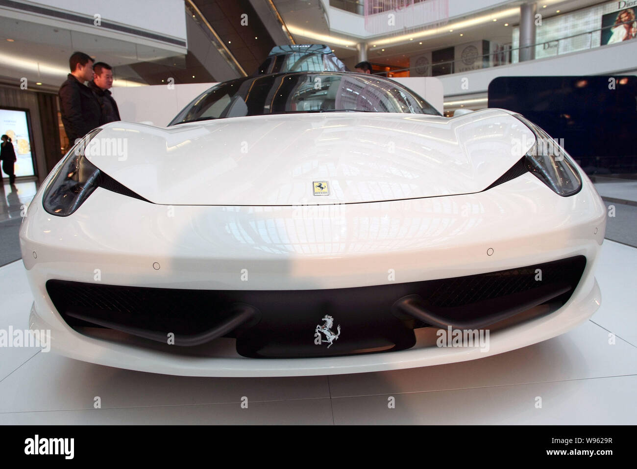 --File--A Ferrari sedan is on display at a shopping mall in Shanghai ...