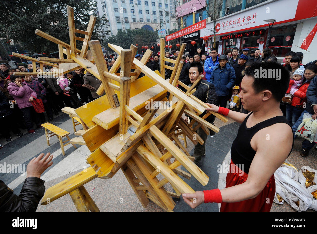 Guinness World Record breaker Li Hongxiao piles up benches in Chongqing ...
