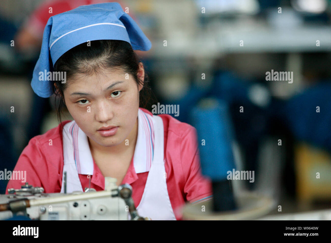 Garment factory worker southeast asia hi-res stock photography and images - Alamy