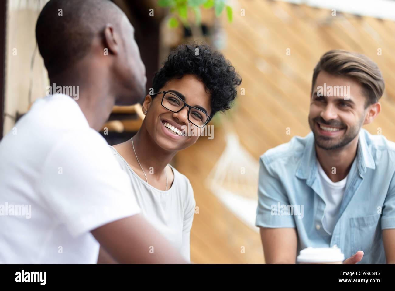 Happy diverse young people have fun relaxing together Stock Photo - Alamy