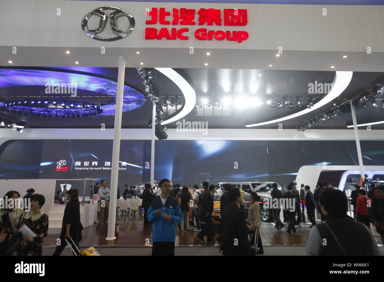 --File--Visitors walk past the stand of BAIC Group during the 12th ...