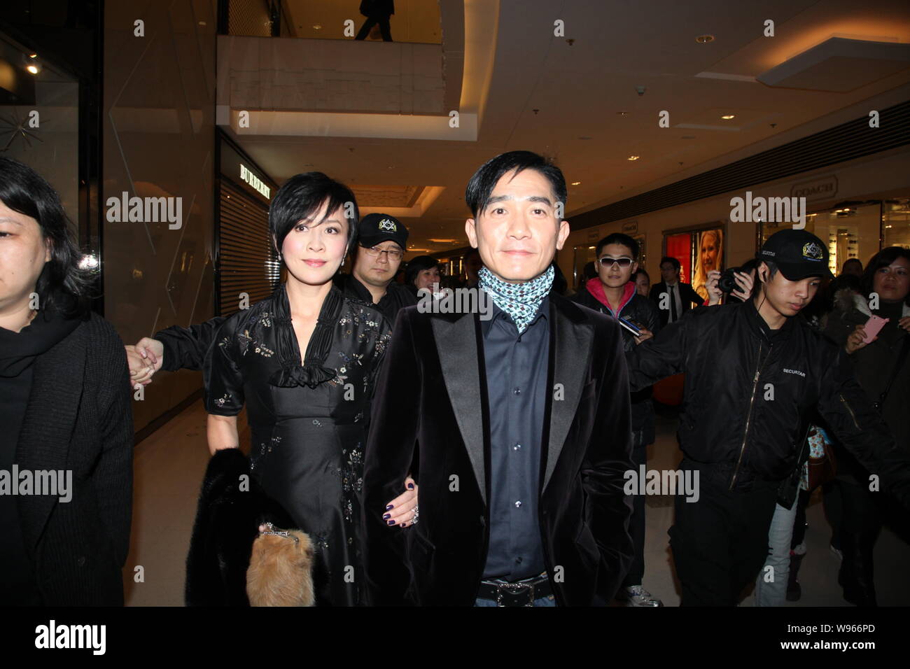 Hong Kong actress Carina Lau and Hong Kong actor Tony Leung Chiu Wai attend a premiere ceremony ...